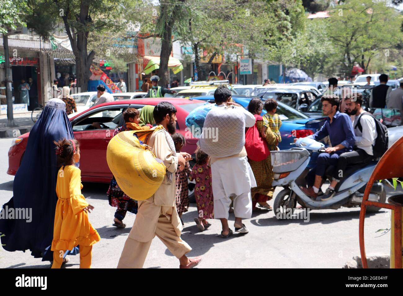 Kabul, Afghanistan. 15th Aug, 2021. People rush to their homes after ...