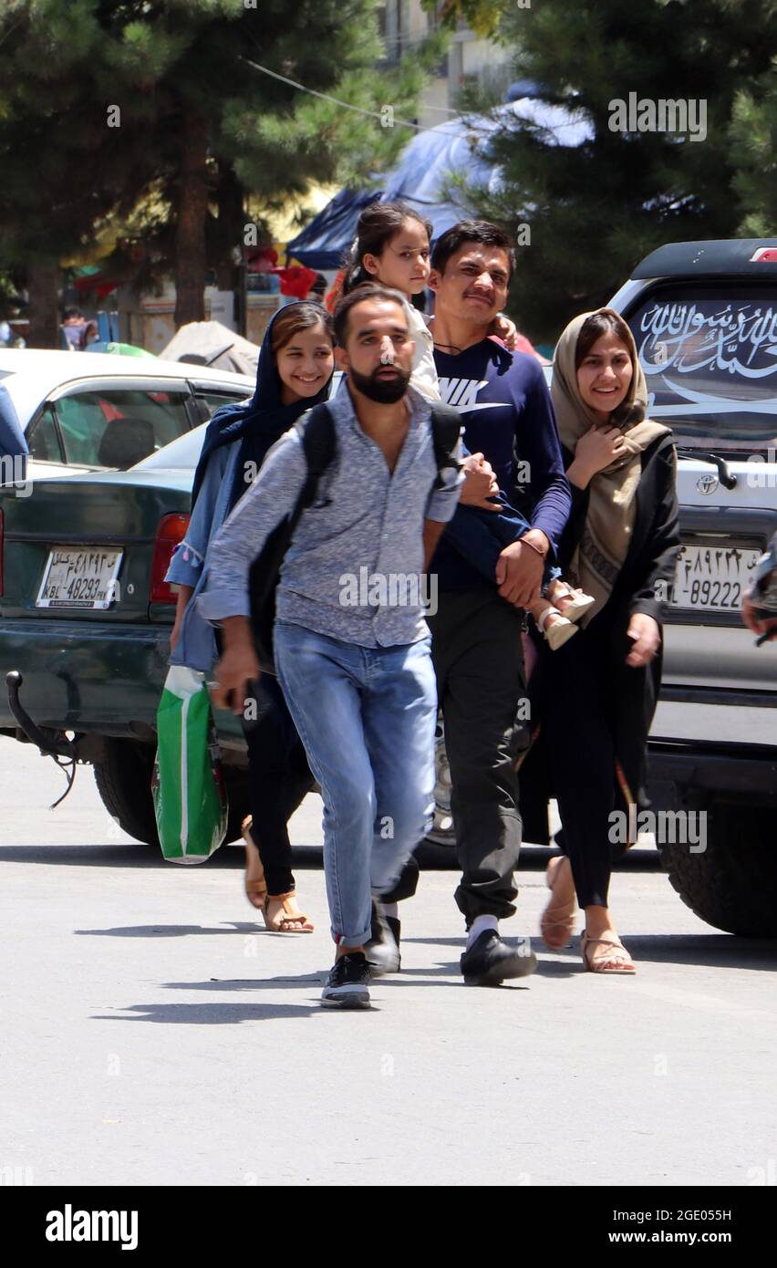 Kabul, Afghanistan. 15th Aug, 2021. People rush to their homes after ...