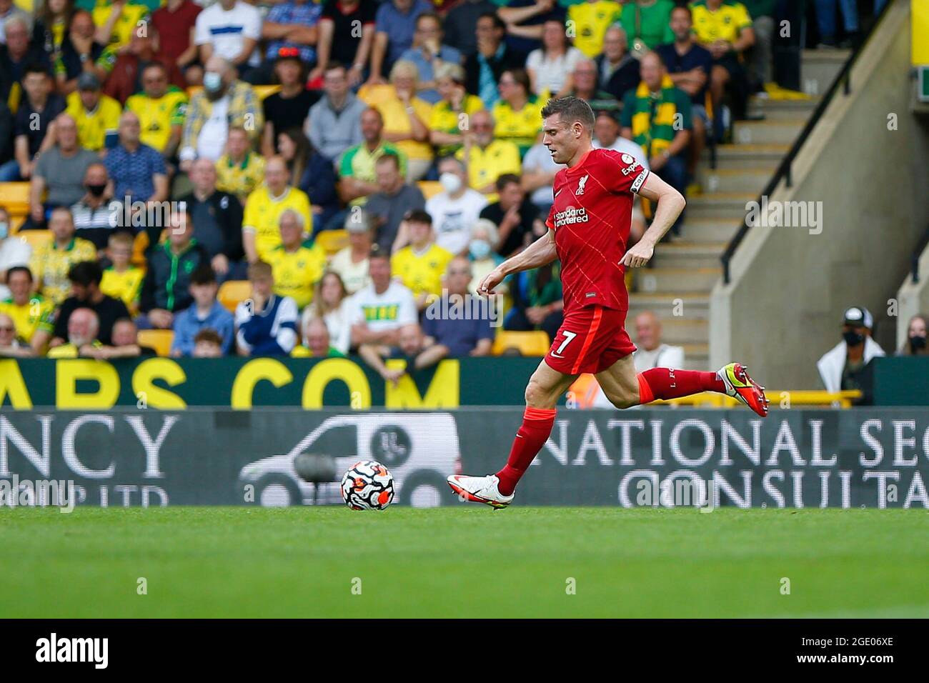 Norwich, UK. 14th Aug, 2021. James Milner of Liverpool runs with the ...