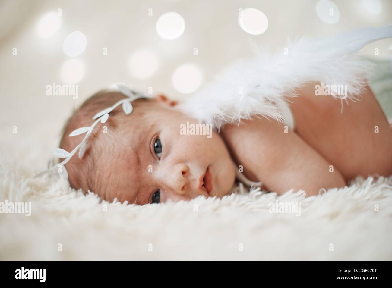 portrait of a cute newborn baby angel Stock Photo - Alamy