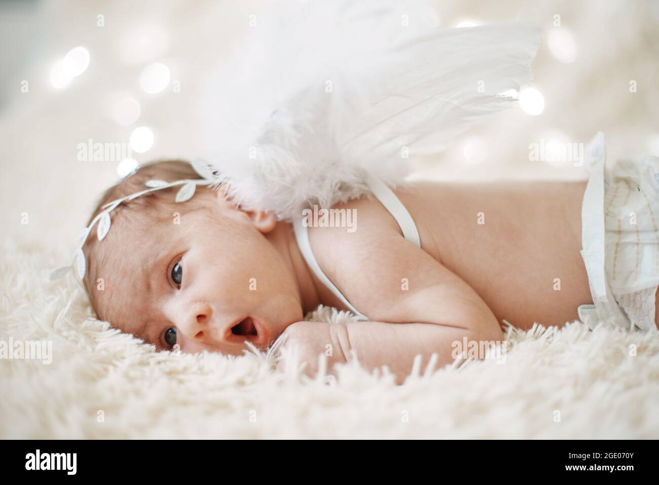 close up. newborn baby angel falling asleep Stock Photo - Alamy