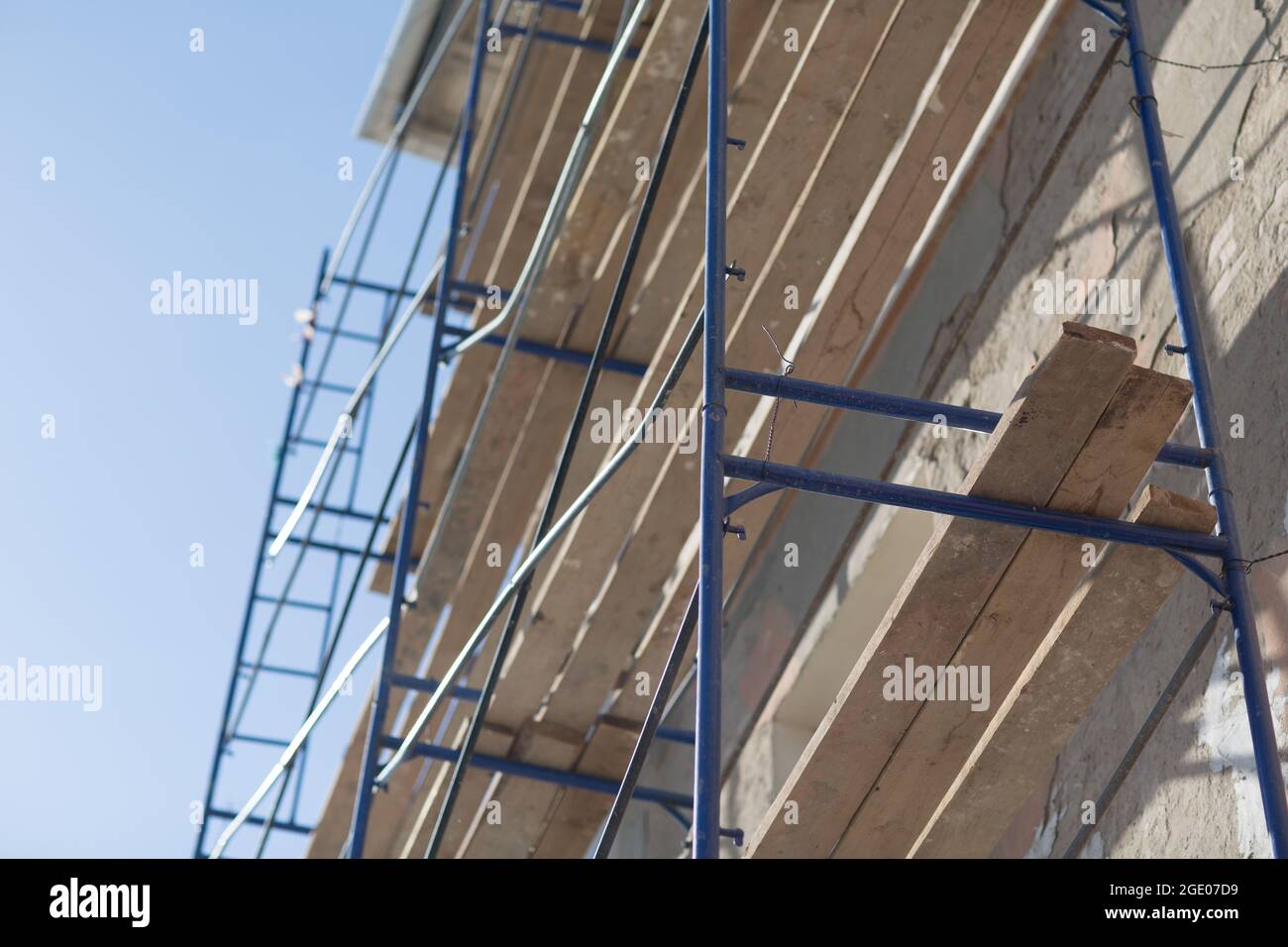 Scaffolding on building house in the city Stock Photo - Alamy
