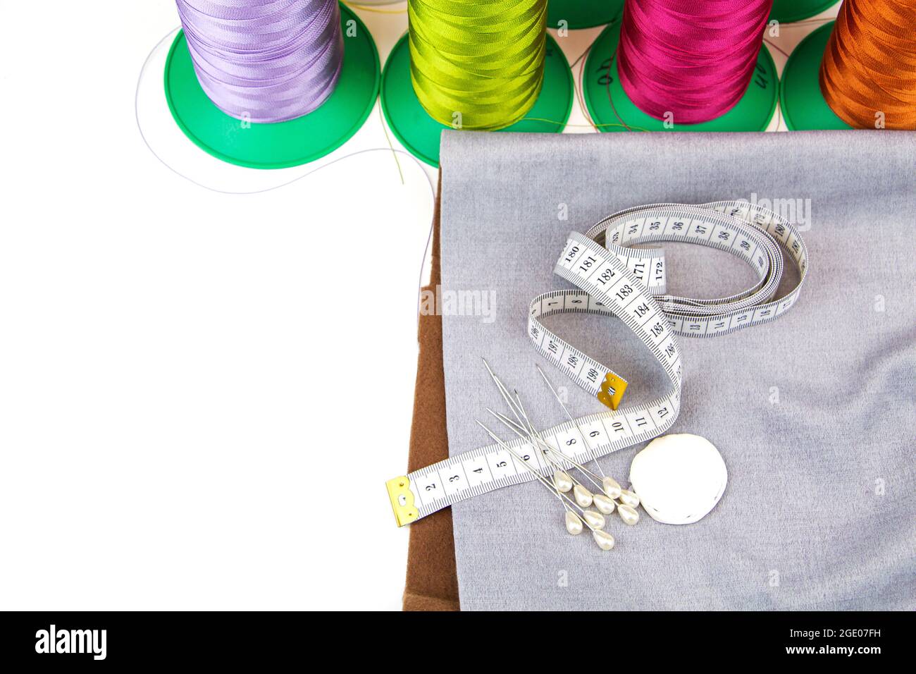 Pieces of fabric and thread. Tailoring, production of clothing and ...