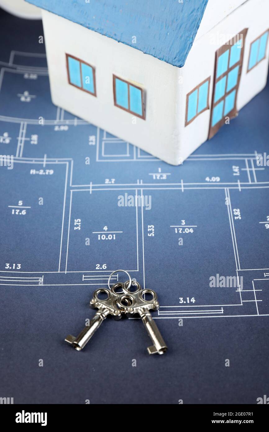 Key on house plan close-up Stock Photo - Alamy