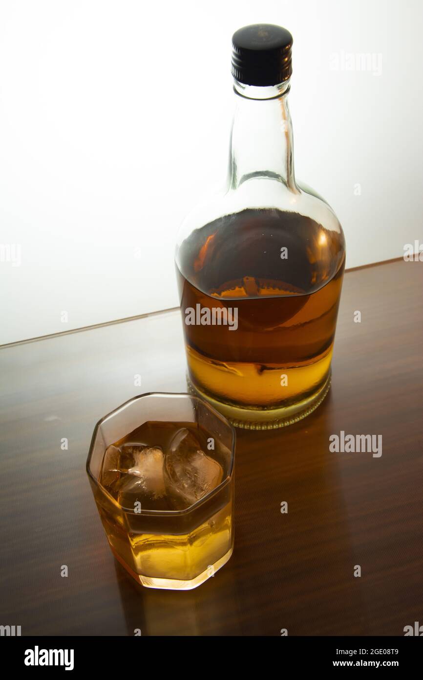 Bottle amber colored whisky hi-res stock photography and images - Alamy