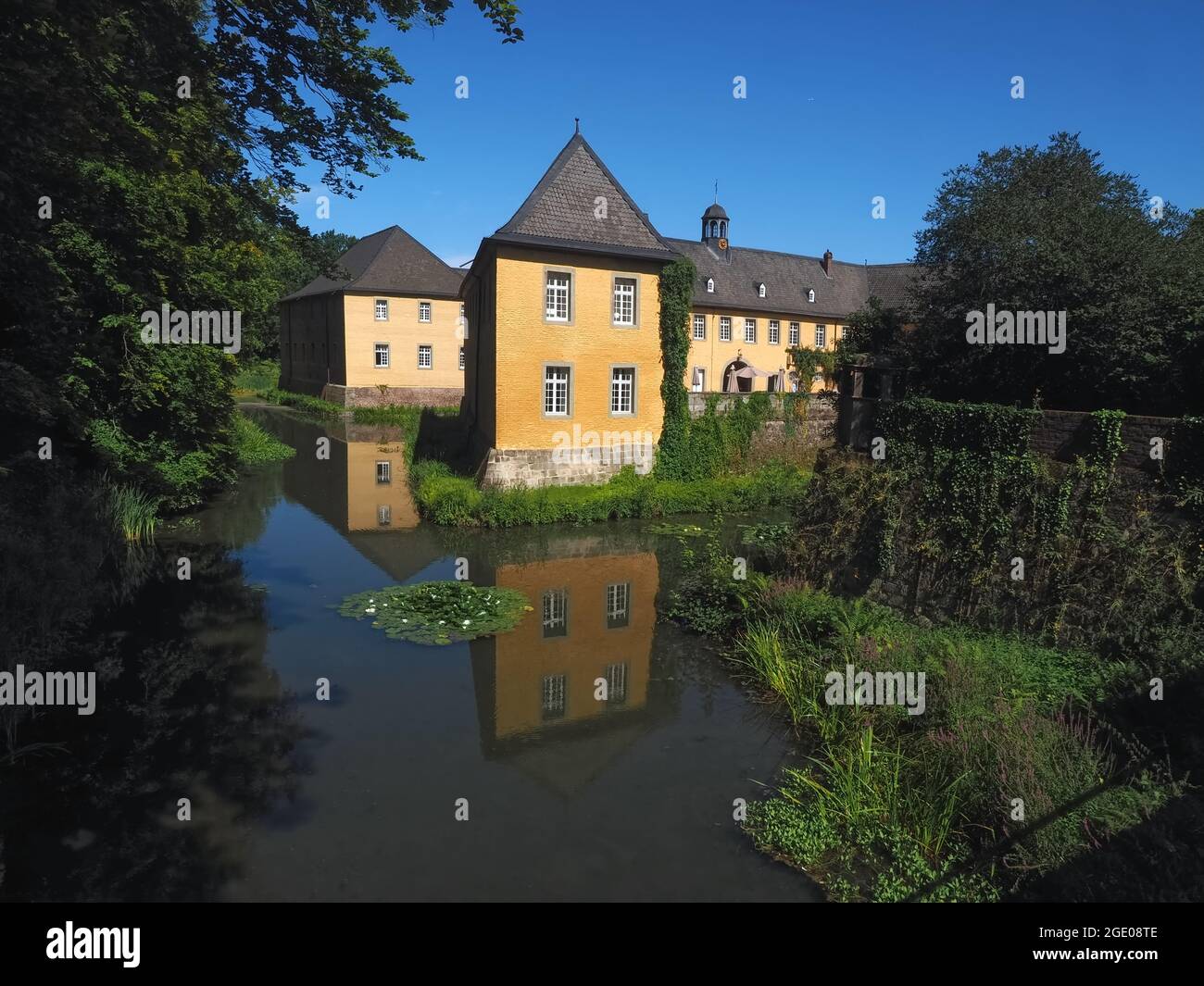 Romantic yellow water castle Schloss Dyck in Juechen in Germany Stock ...