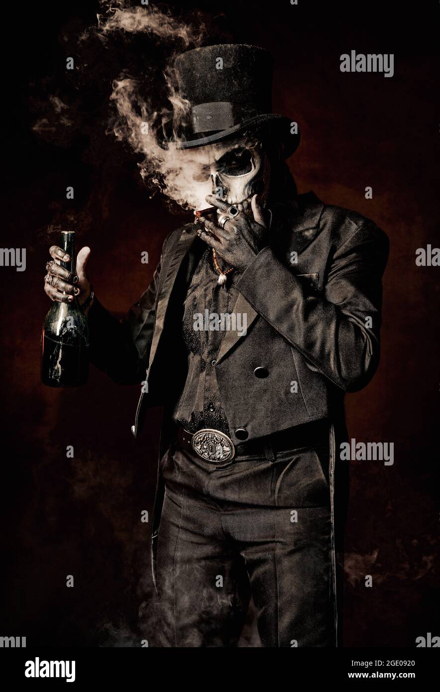 A young man in image of Baron Samedi, the Voodoo deity. Baron Saturday ...