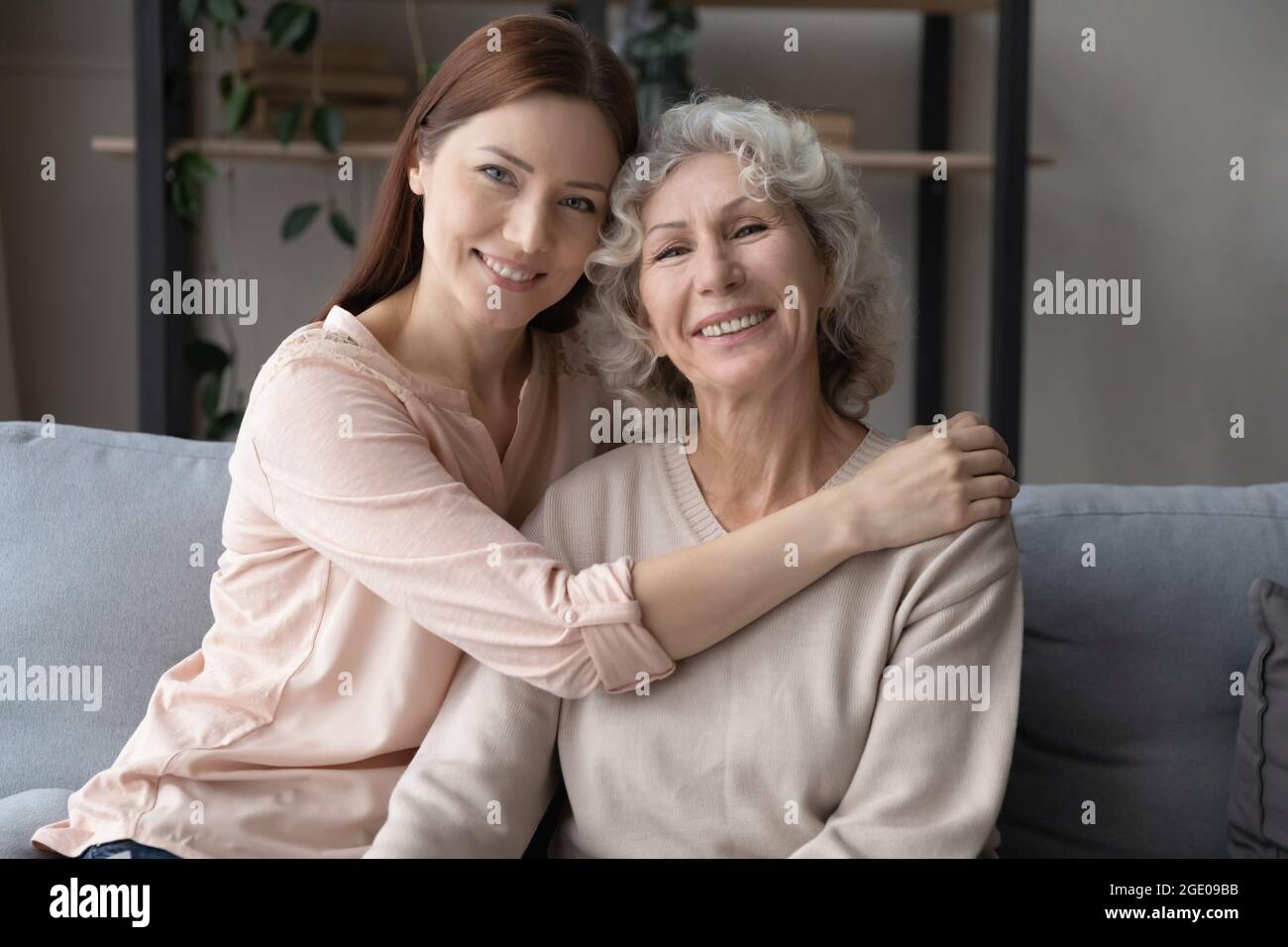 Portrait of grownup daughter and senior mom relax at home Stock Photo - Alamy