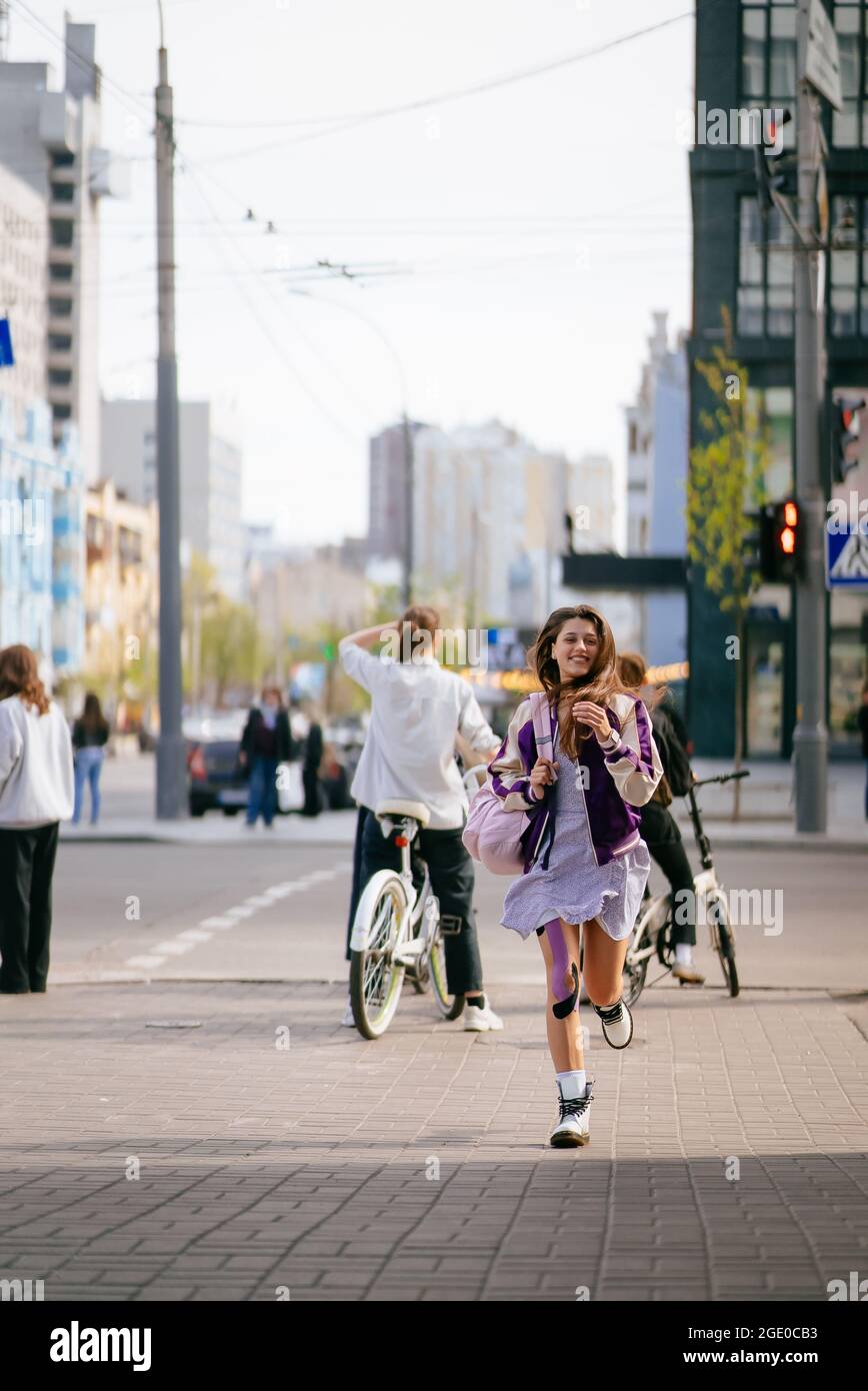 Pretty young woman, walking at the street Stock Photo - Alamy
