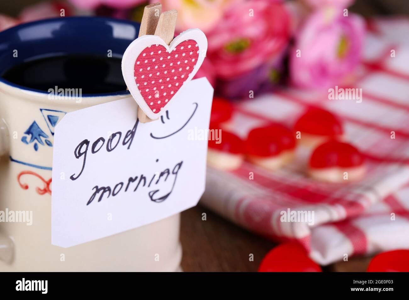 Cup of tea with card that says good morning on table close-up Stock ...