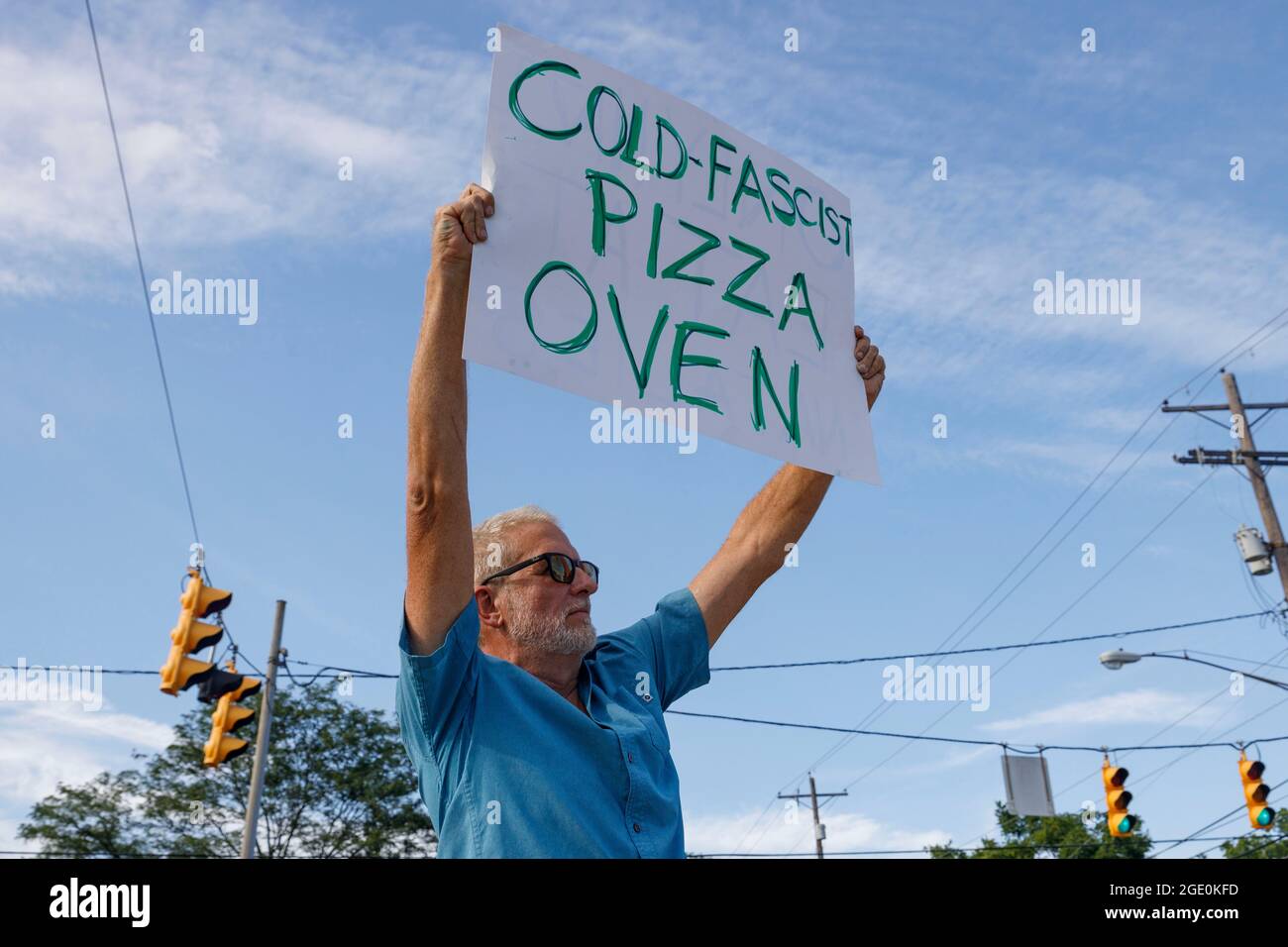 Terry Sweeton of Nashville, Tennessee holds a sign that says Cold ...