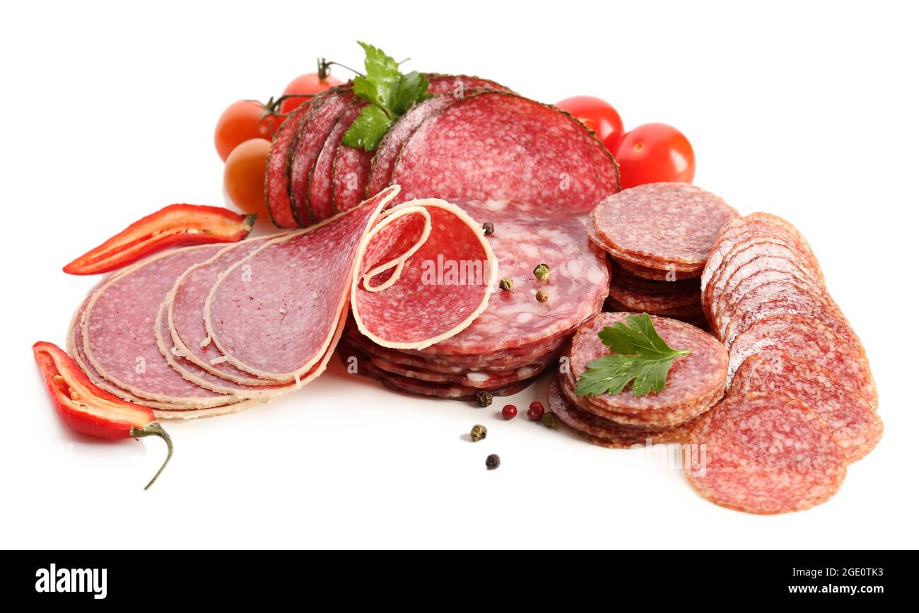 Various sliced salami with chili pepper, cherry tomatoes and spices ...