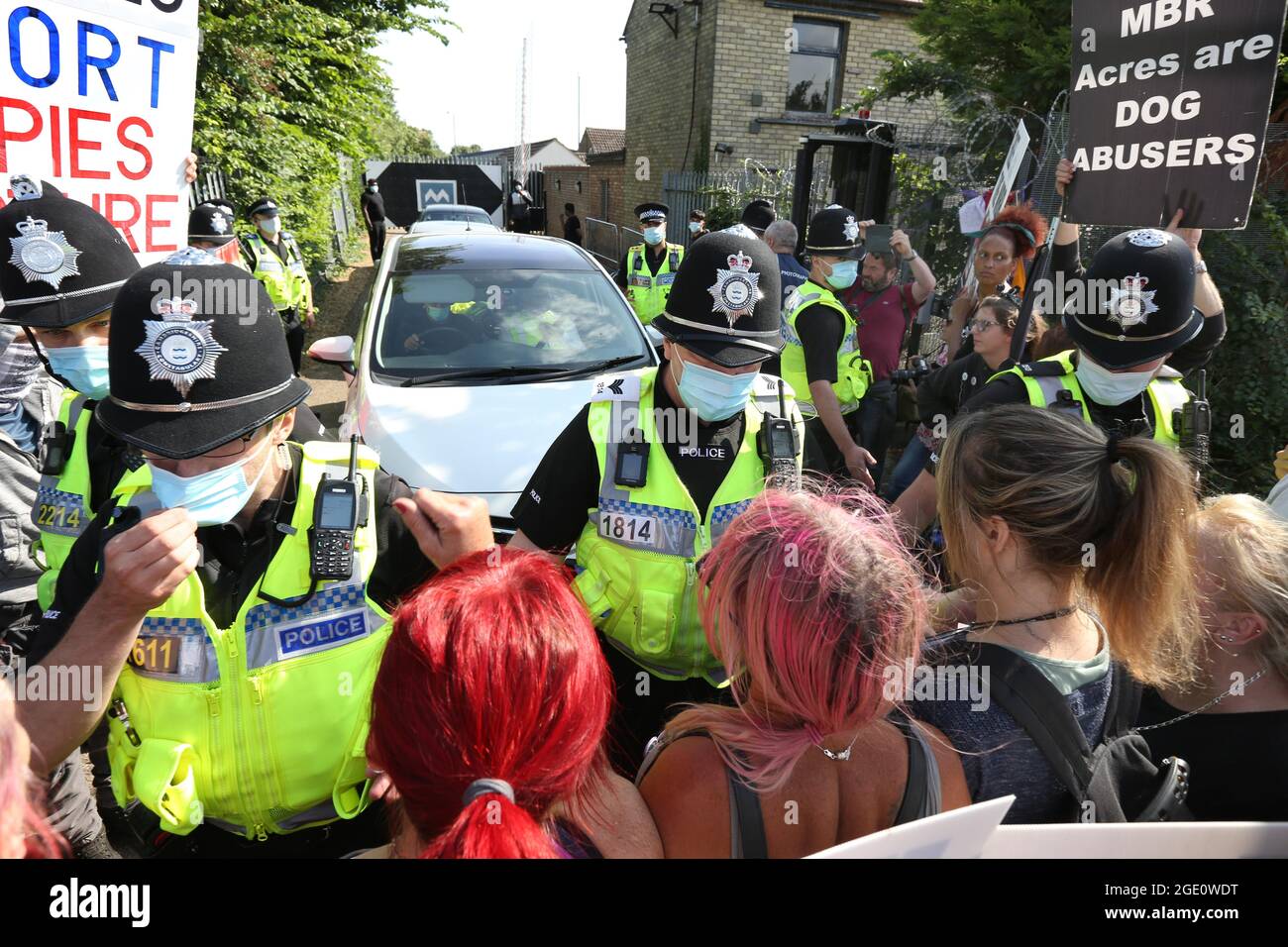 Huntingdon, UK. 15th Aug, 2021. Police officers attempt to clear MBR ...