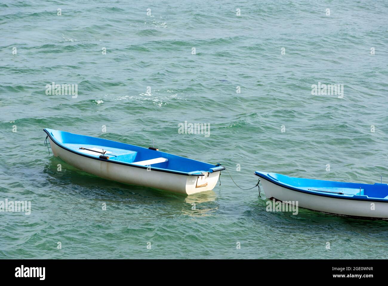 High angle view of two empty fishing boats floating on water Stock ...