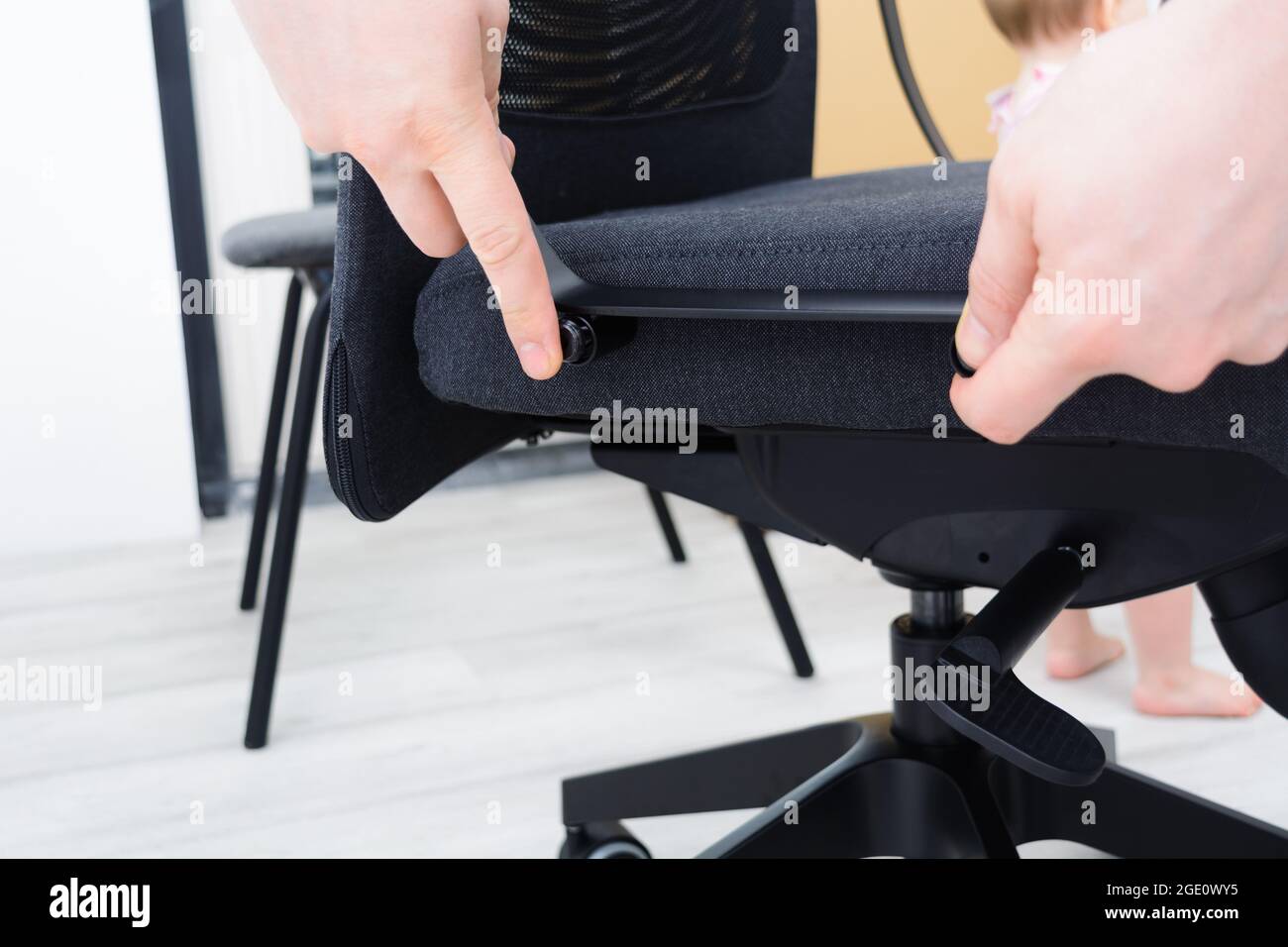 Man hands screw chair handle Assembling chair Step by step instructions ... Man hands screw chair handle Assembling chair Step by step instructions ...