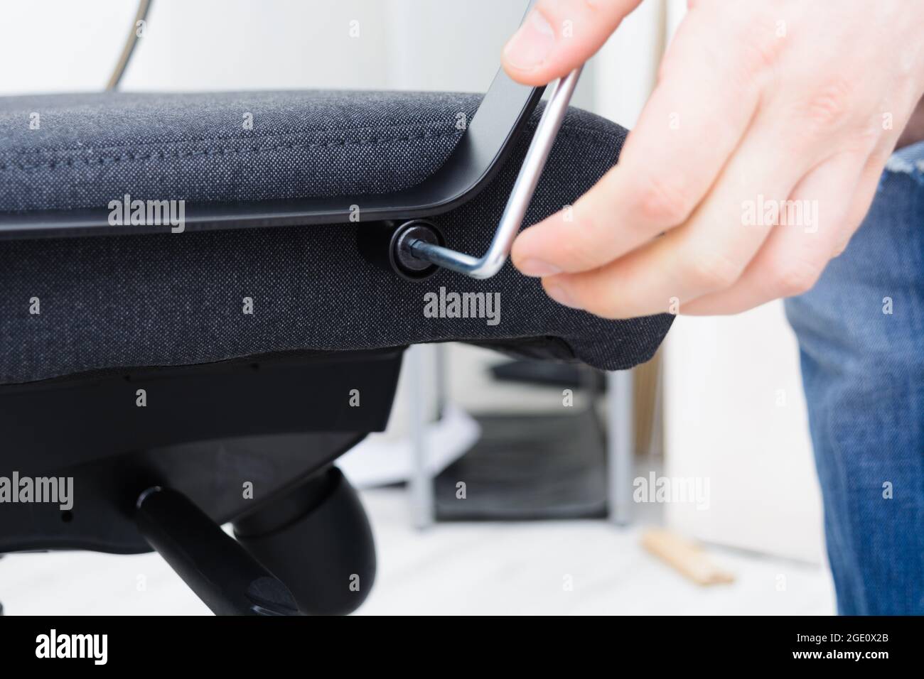 Man hands screw chair handle Assembling chair Step by step instructions ... Man hands screw chair handle Assembling chair Step by step instructions ...