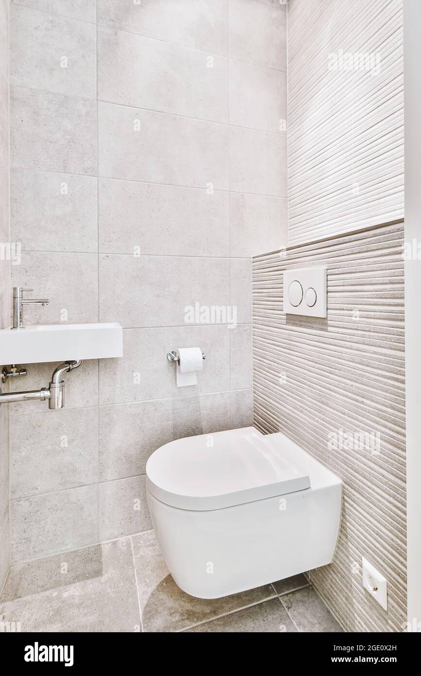 Interior of small clean washroom in miniature style Stock Photo - Alamy