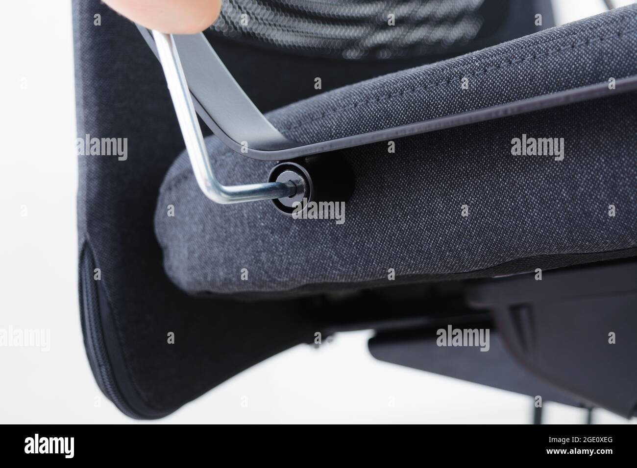 Man hands screw chair handle Assembling chair Step by step instructions ...