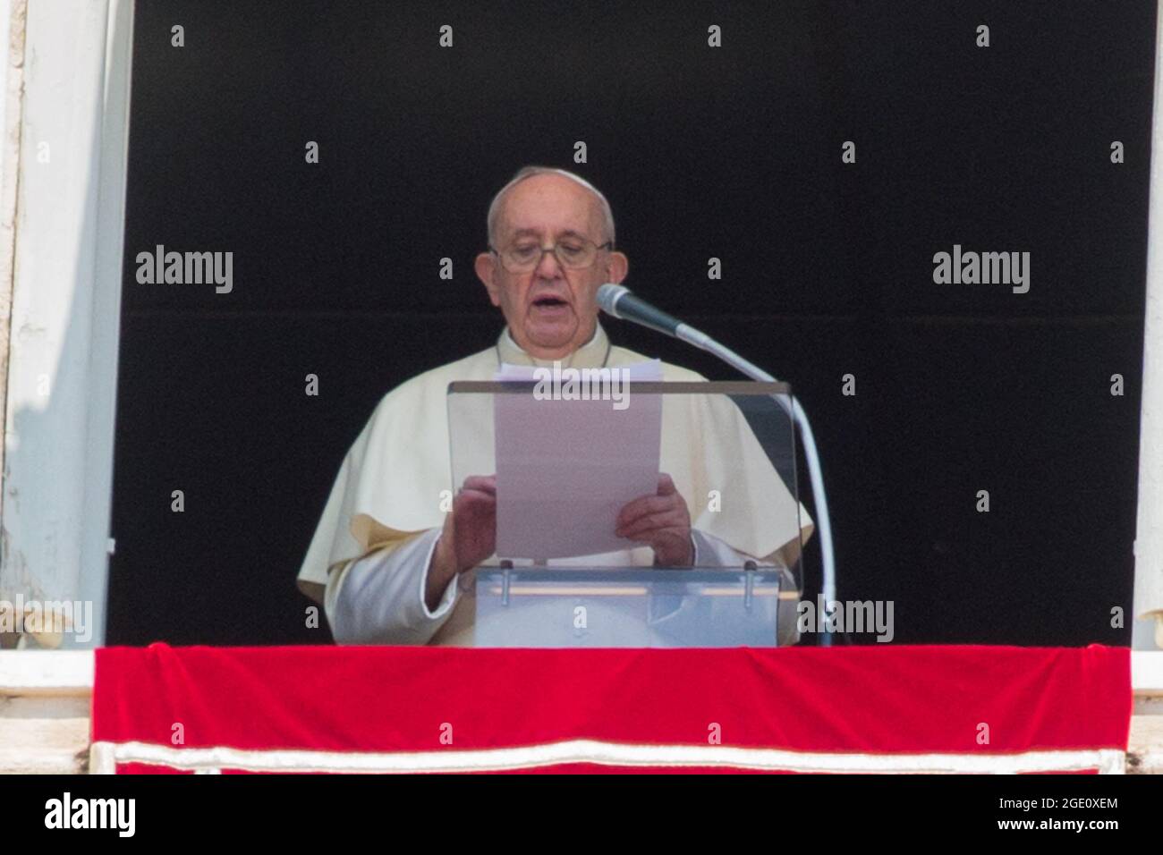 Pope Francis waves from the window of the apostolic palace overlooking ...
