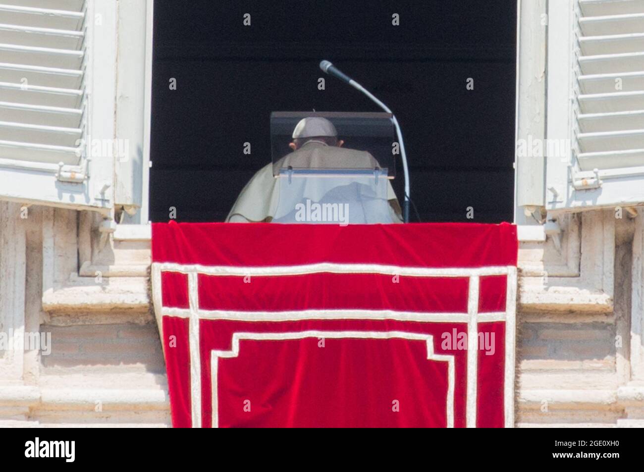 Pope Francis waves from the window of the apostolic palace overlooking ...