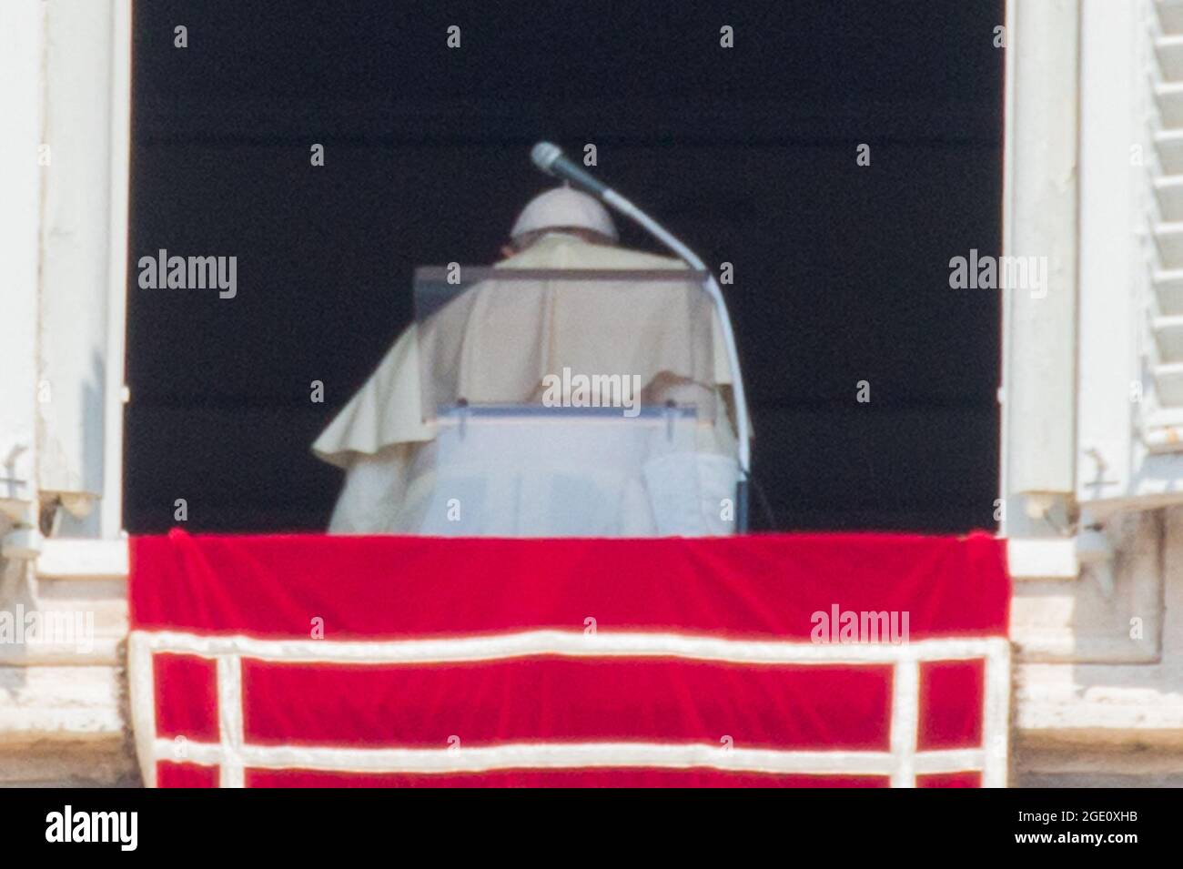 Pope Francis waves from the window of the apostolic palace overlooking ...