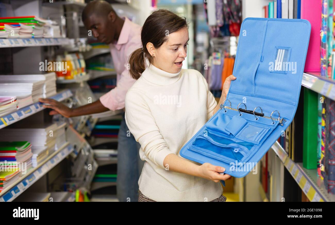 Happy african man holding folder hi-res stock photography and images ...
