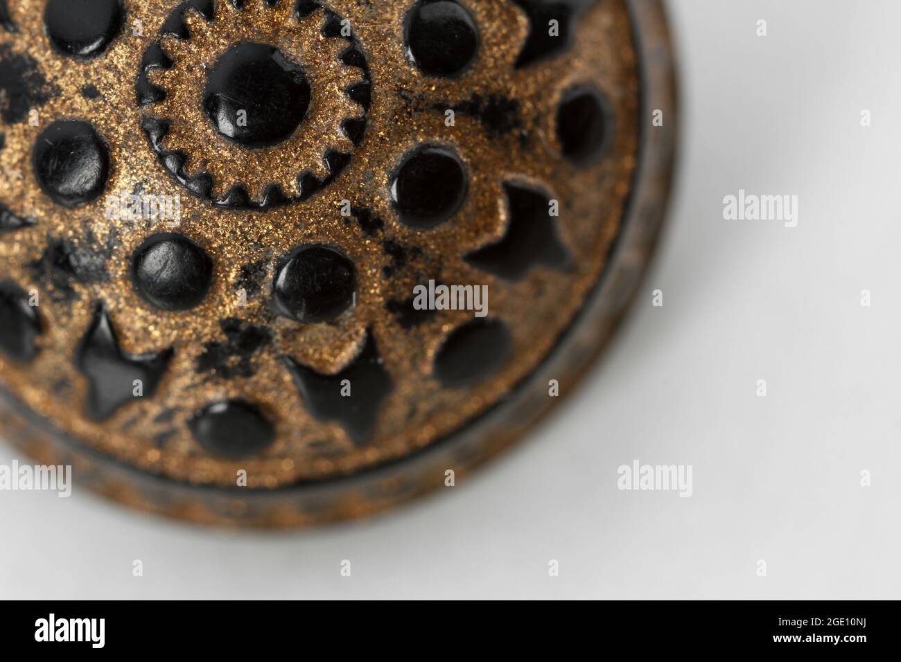 Bronze button isolated on white Stock Photo - Alamy