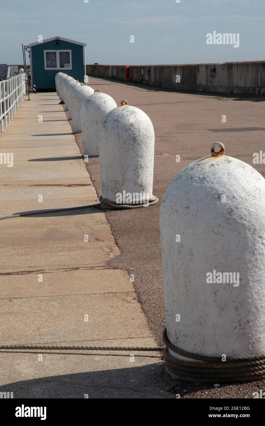 Line of bollards along the harbour pier, Ramsgate, Kent, England UK Stock Photo - Alamy