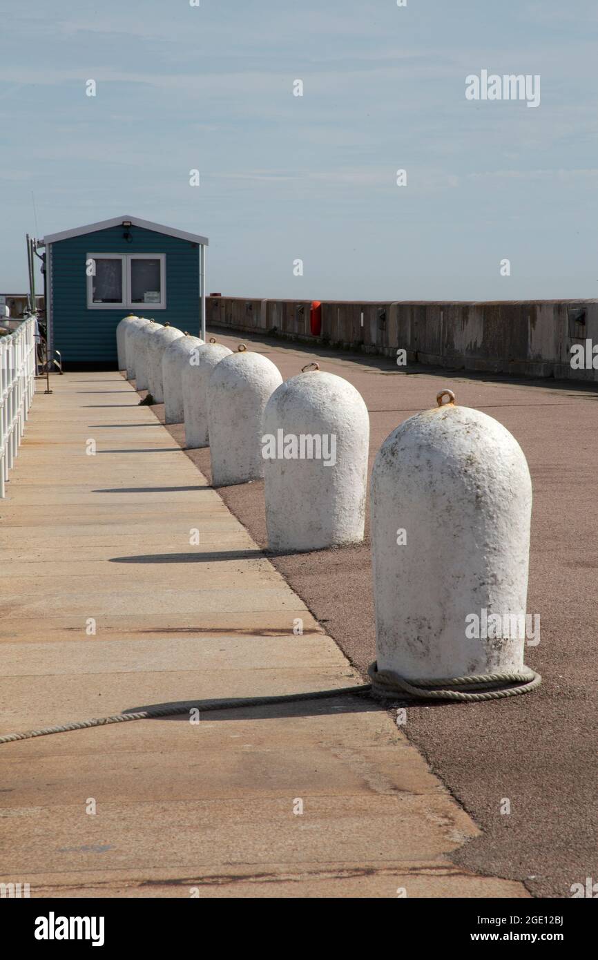 Line of bollards along the harbour pier, Ramsgate, Kent, England UK Stock Photo - Alamy
