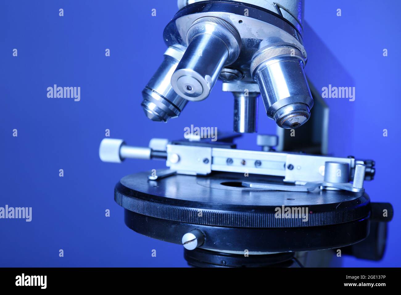 Microscope on color background, close-up Stock Photo - Alamy