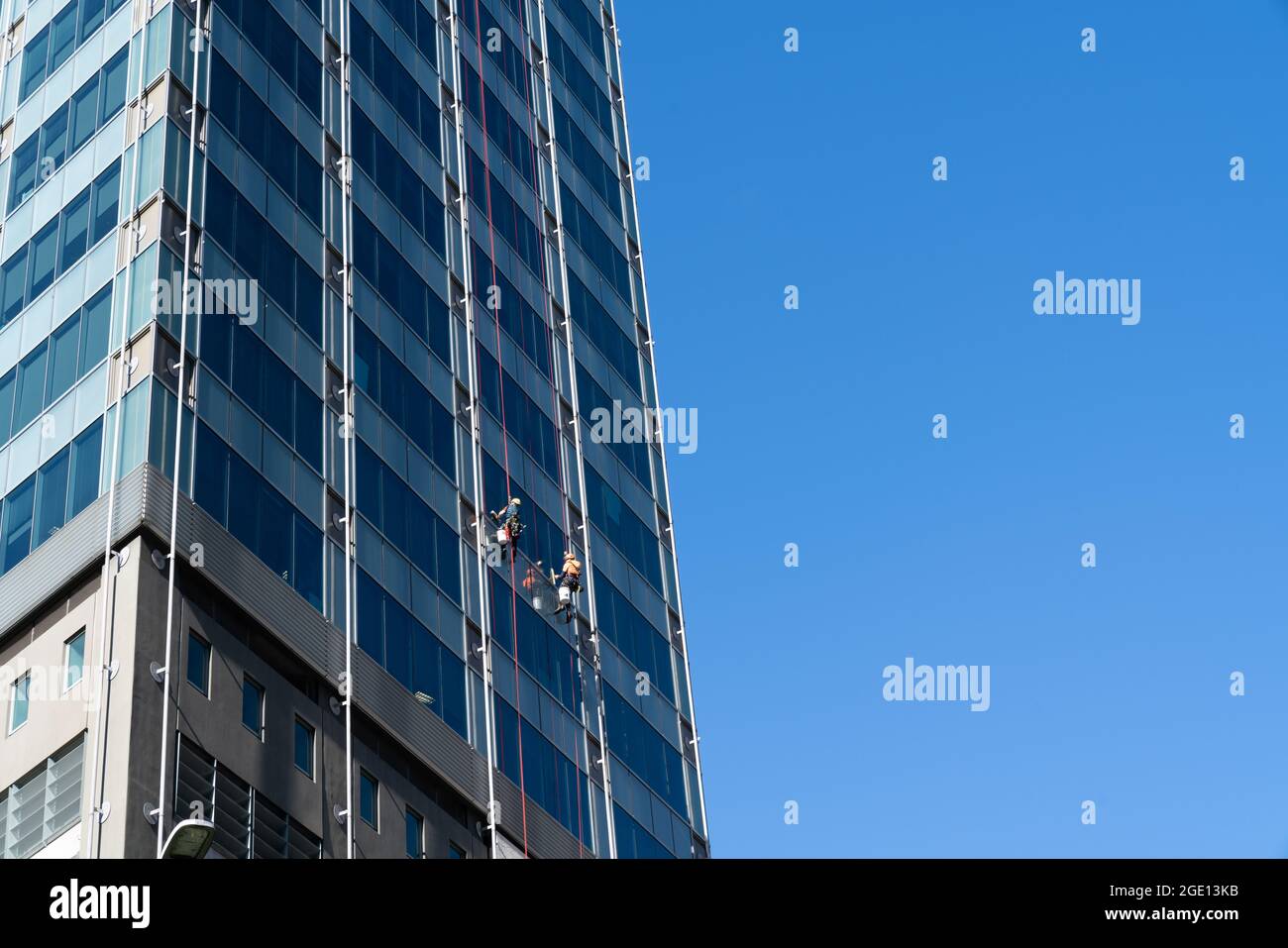 Wellington New Zealand - July 28 2021; Blue sky and glass facade of ...