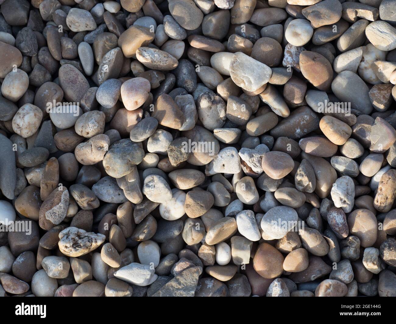 background of different round edged stones of different colors Stock ...