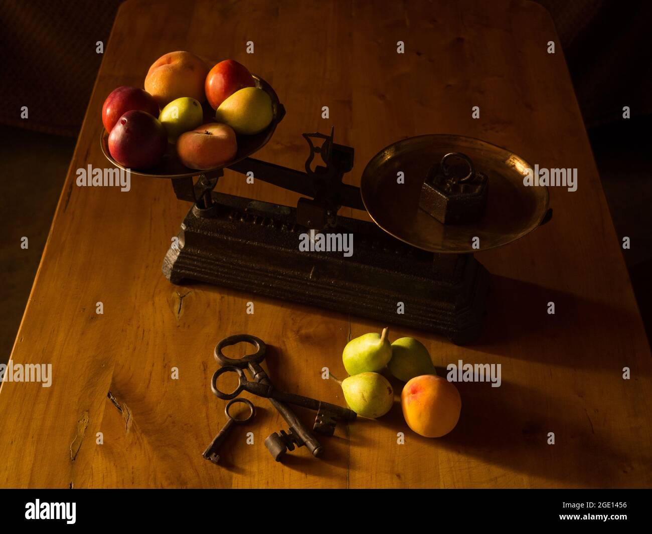 old weighing machine, with different fruits Stock Photo - Alamy
