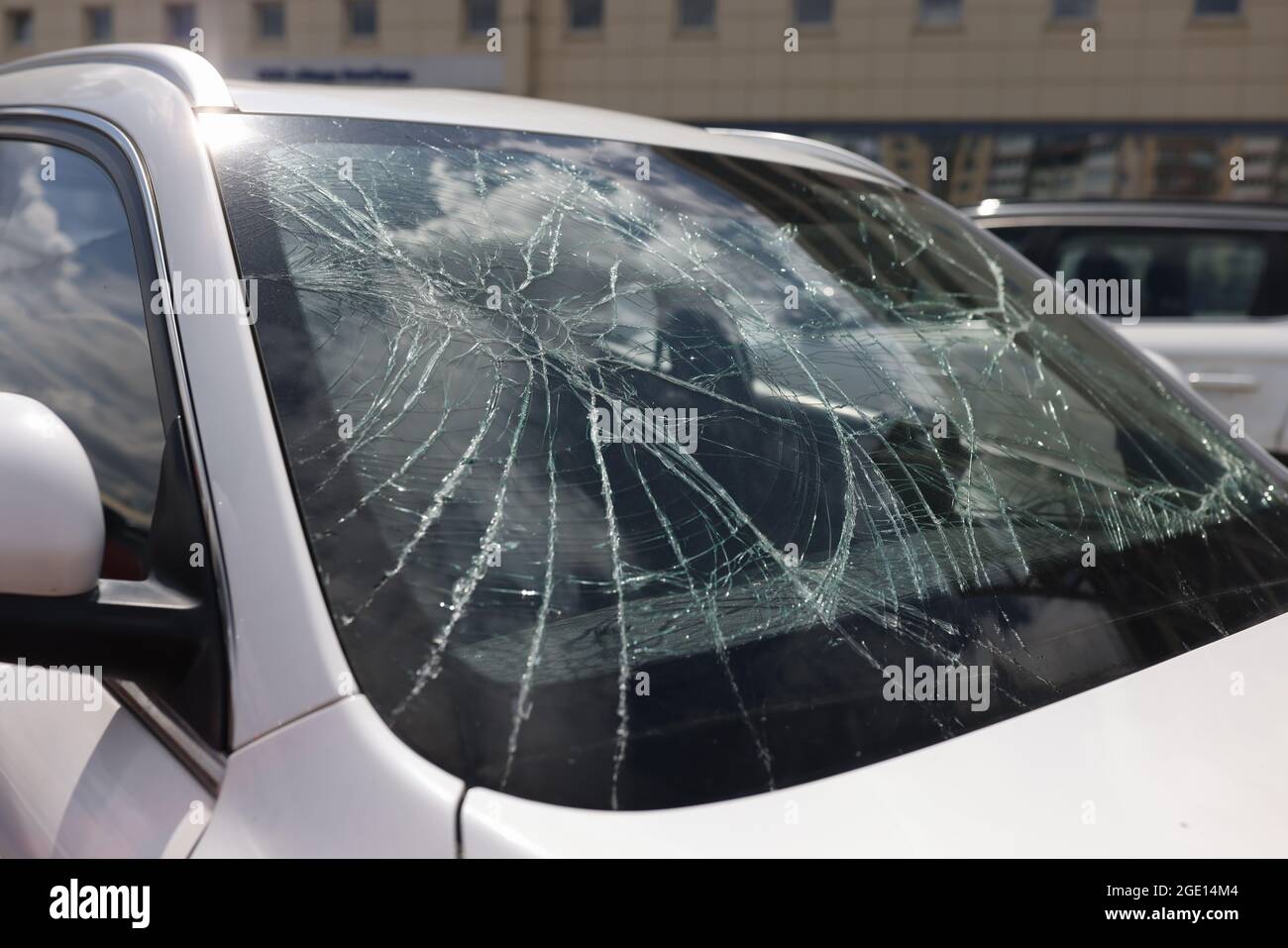 Closeup of cracks on broken car windshield Stock Photo - Alamy