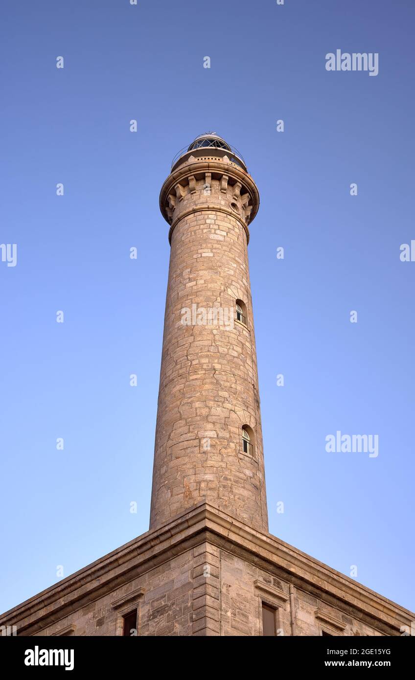 detail of a stone lighthouse tower with blue sky Stock Photo - Alamy