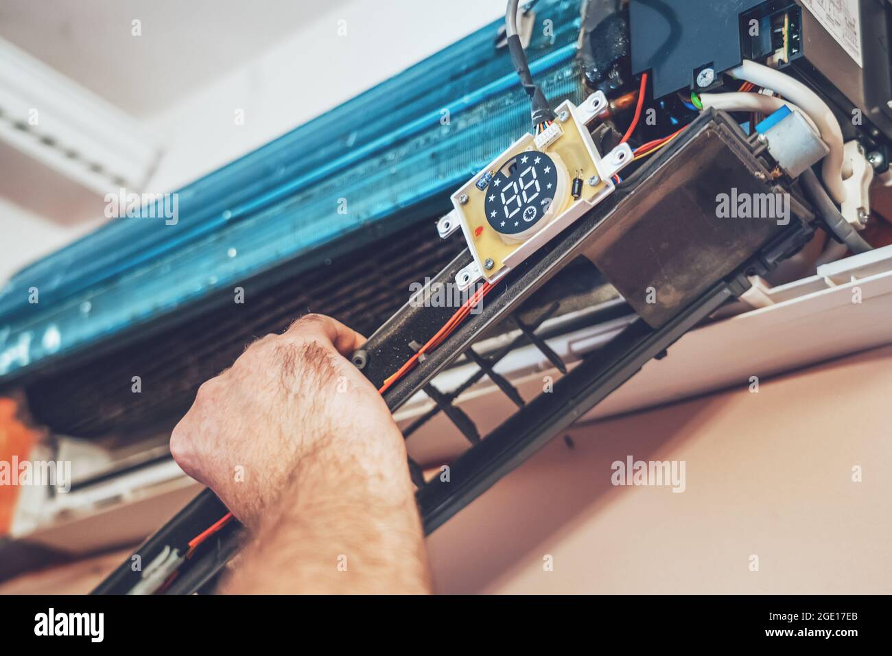 Technician installing checking air hi-res stock photography and images ...