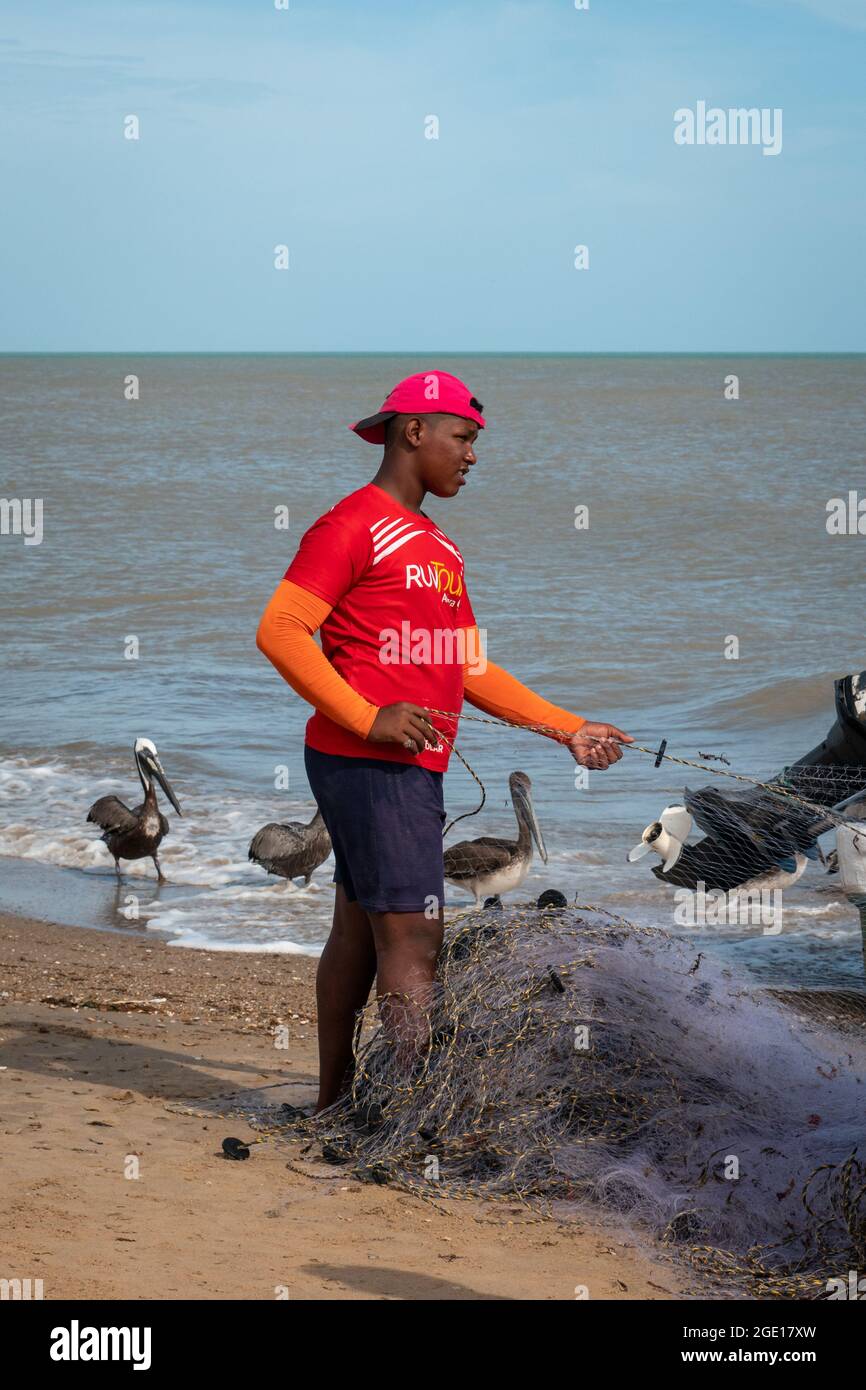 Black man fishing boat hi-res stock photography and images - Alamy