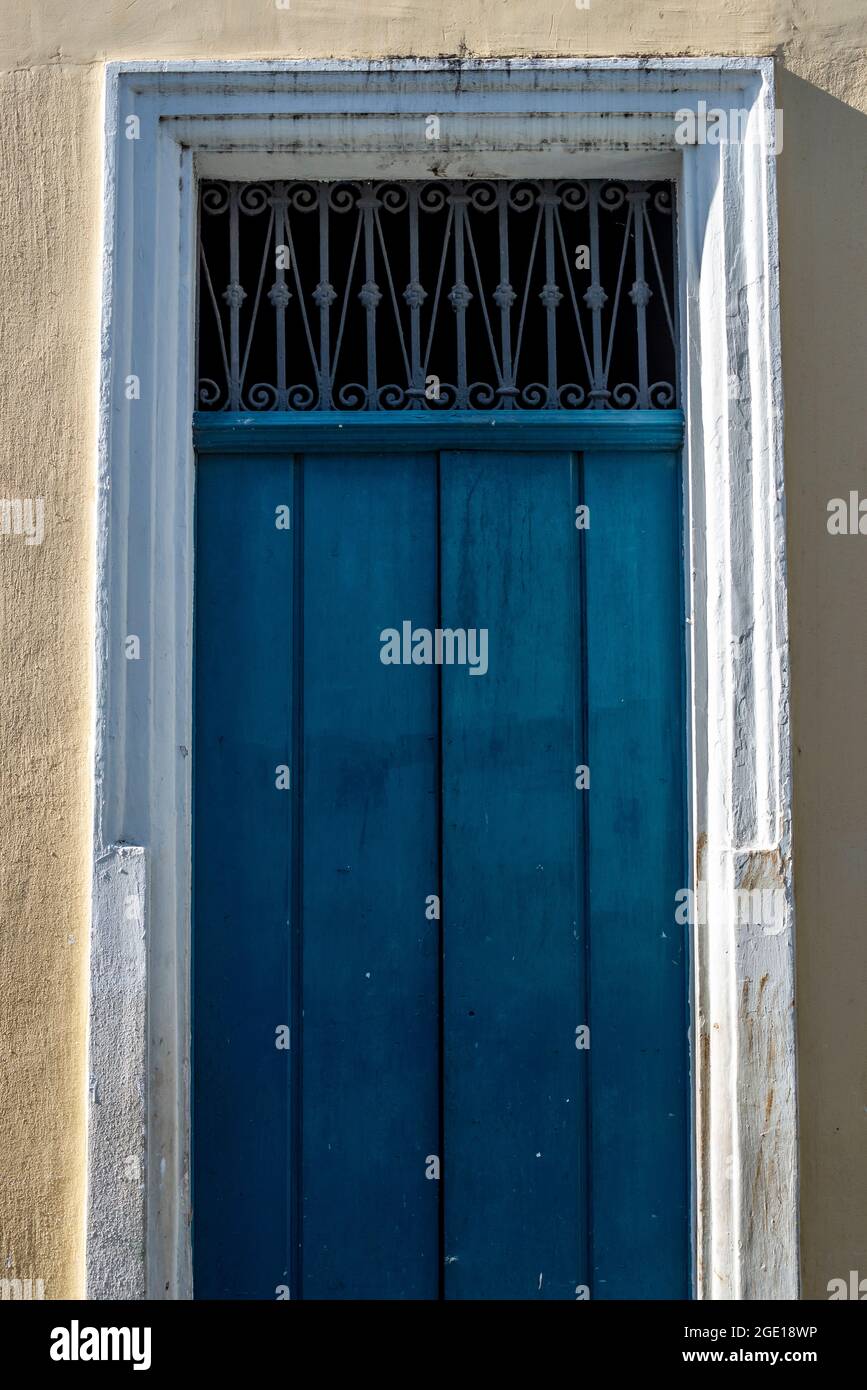 Antique door details in color with shadow, iron, cement, wood ...