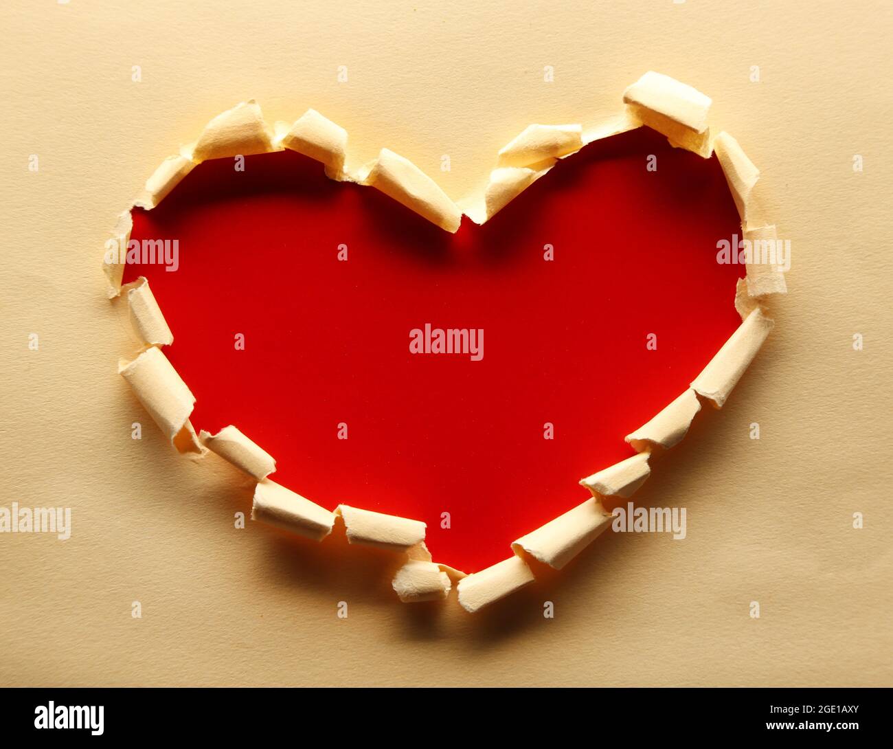 Torn paper heart over colorful background Stock Photo - Alamy