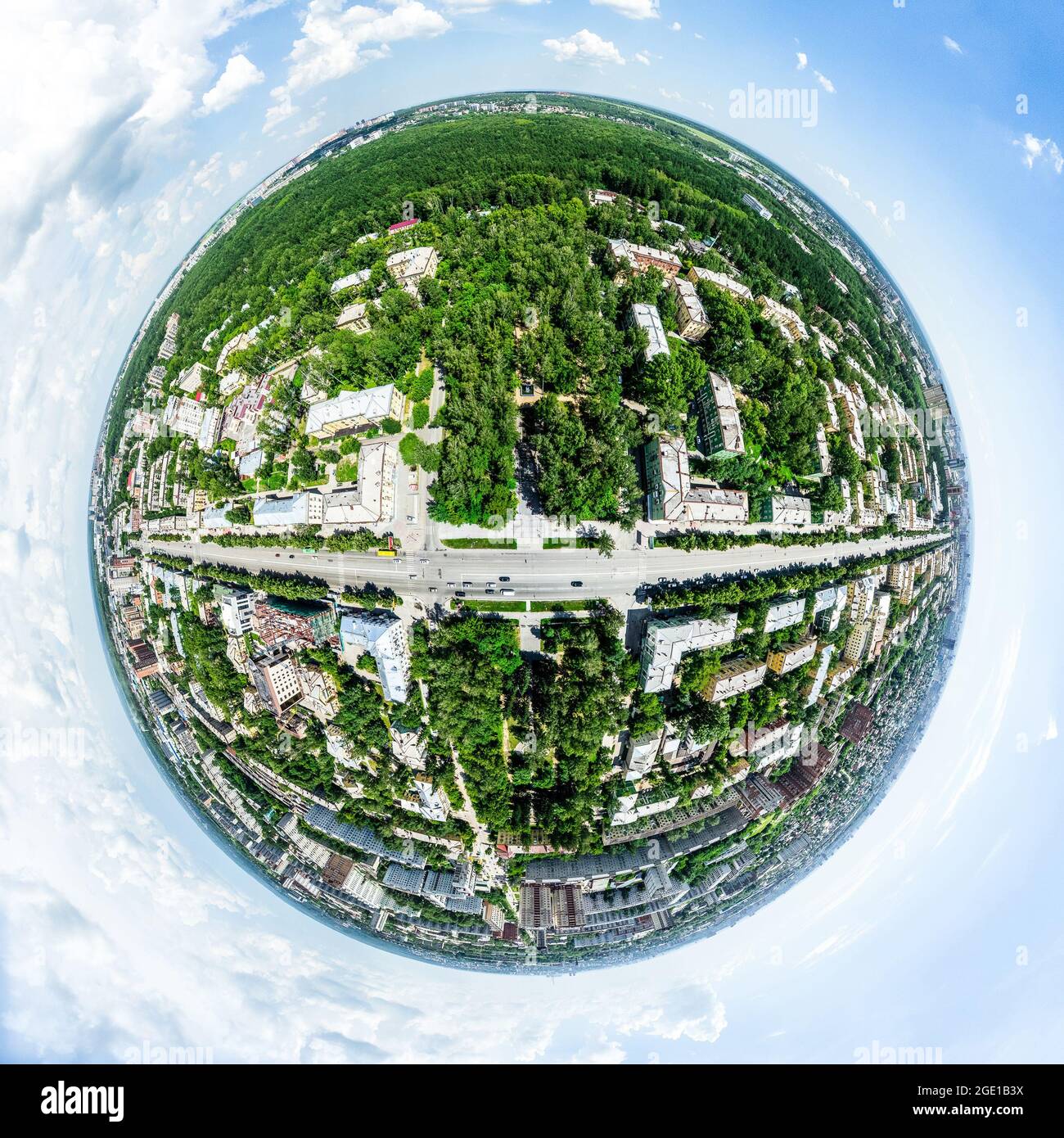 Aerial city view with crossroads and roads, houses, buildings, parks ...