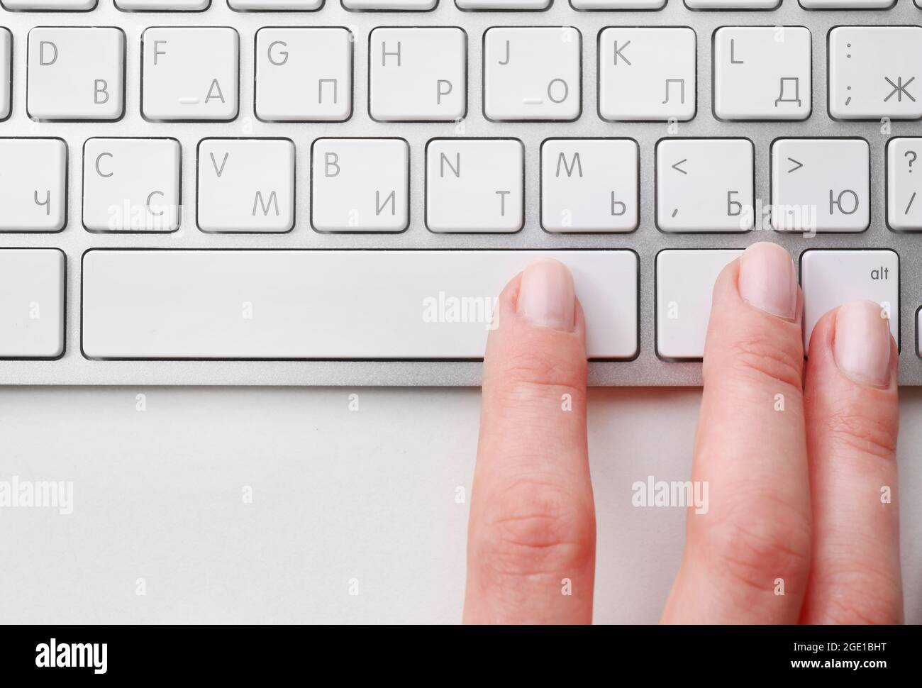 Female hand with keyboard on white background Stock Photo - Alamy