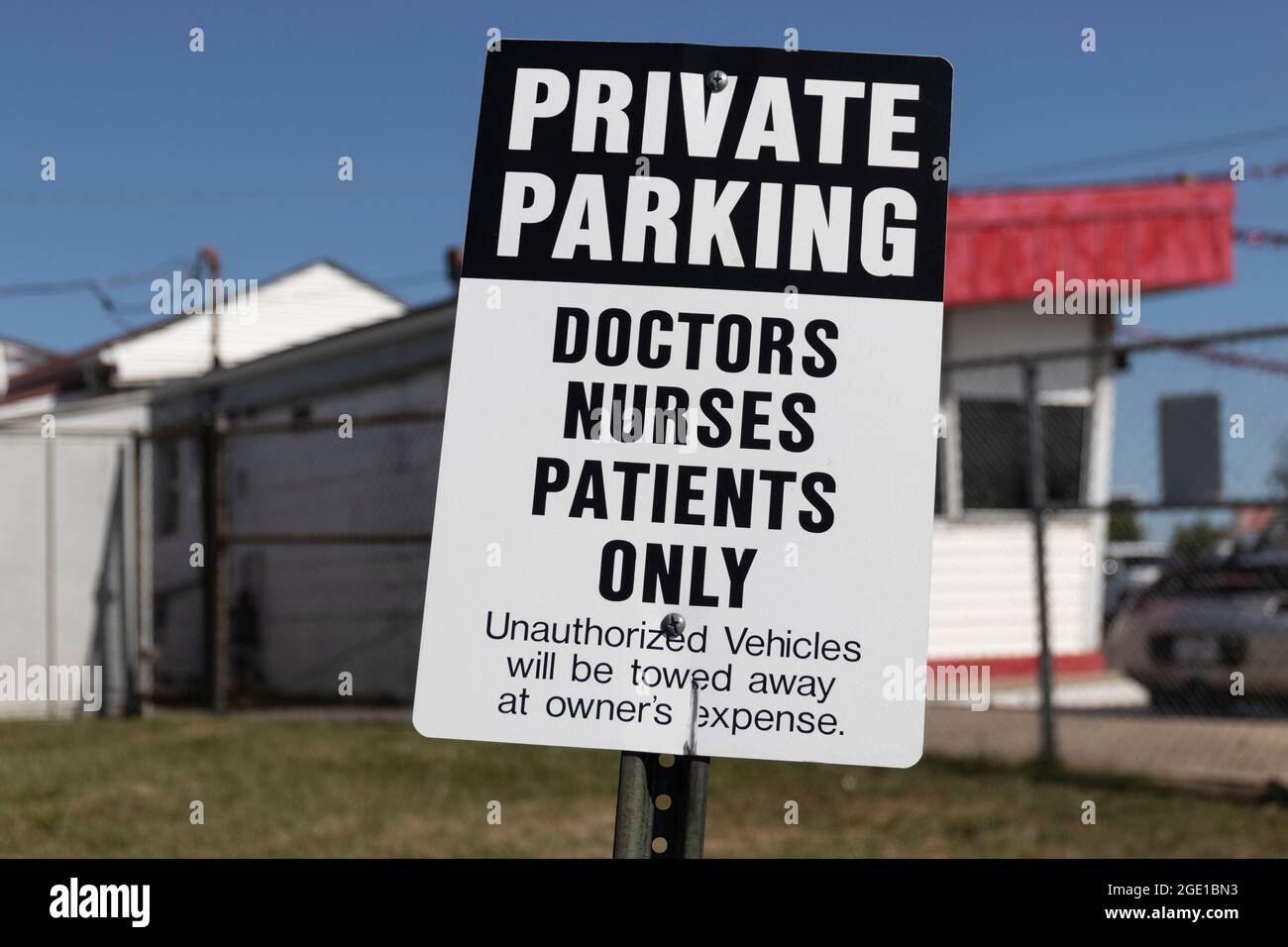 PRIVATE PARKING - DOCTORS NURSES PATIENTS ONLY Sign. A sign that ...