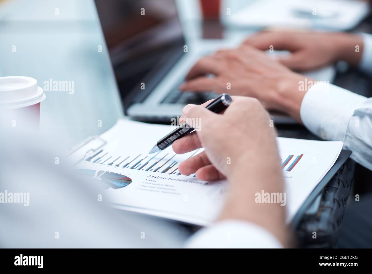 image of a group of business people checking financial data Stock Photo ...