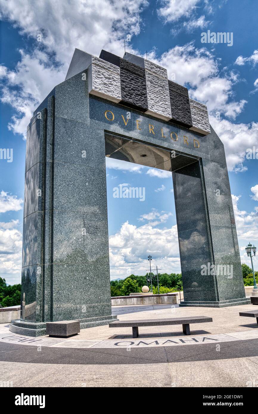 The granite Overlord Arch standing in the Robey W. Estes Plaza at The ...