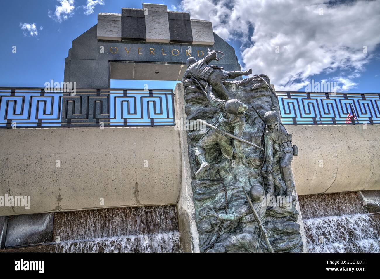 The Scaling the Wall sculpture leading up to the Overlord Arch at The ...