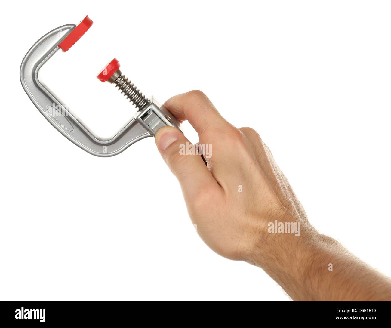 Clamp tool in male hand isolated on white Stock Photo - Alamy