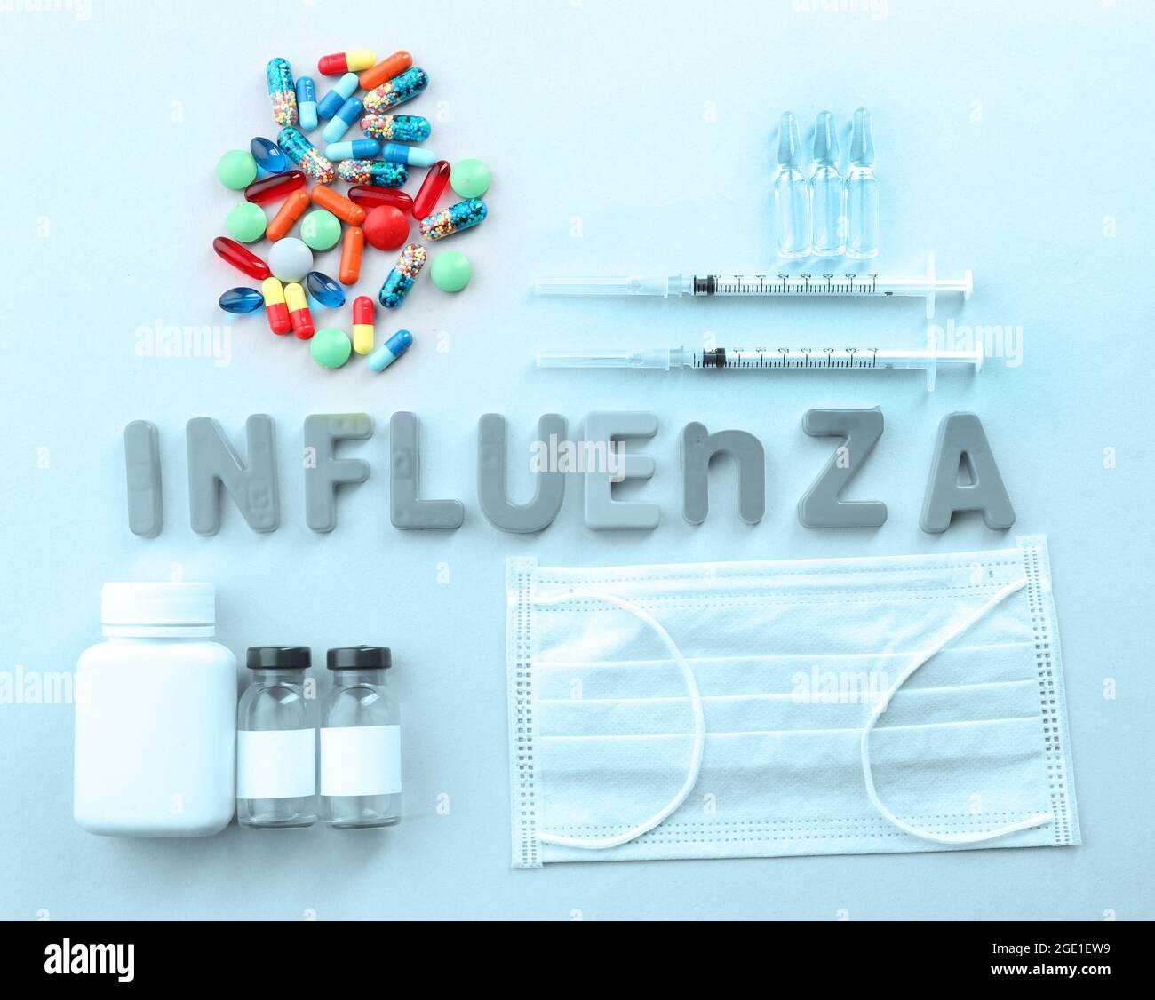 Medicines with word Influenza on light background Stock Photo - Alamy