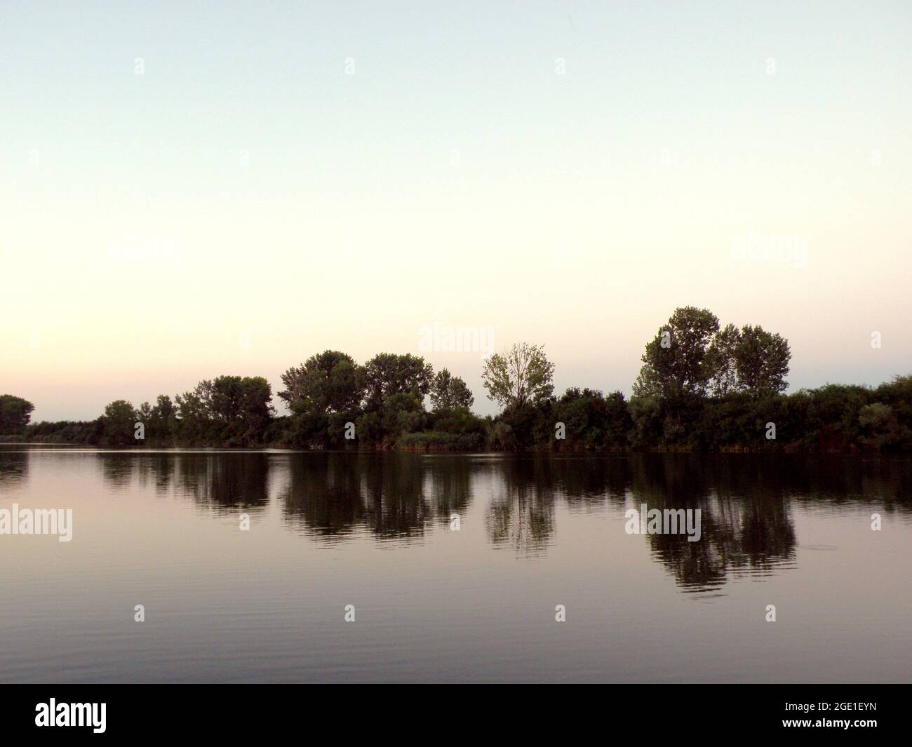 Quiet and Calm Sunset Lake Landscape with Trees Reflecting in Tranquil ...