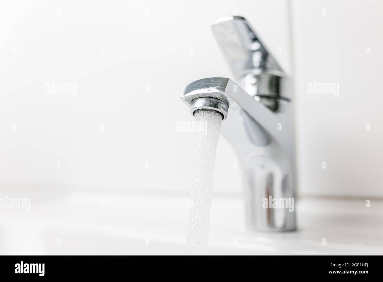Freiburg, Germany. 09th Aug, 2021. Water runs out of a tap. Credit ...