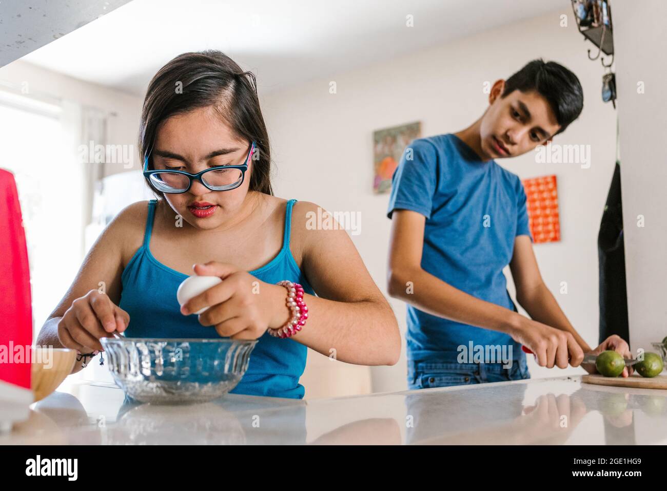 Down syndrome girl cook hi-res stock photography and images - Alamy